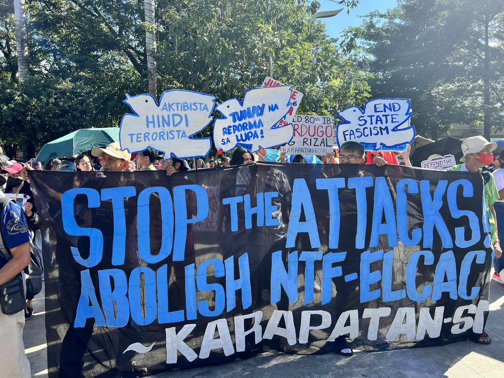 Armed Police Dressed as Civilian Meddles in Human Rights Day Rally